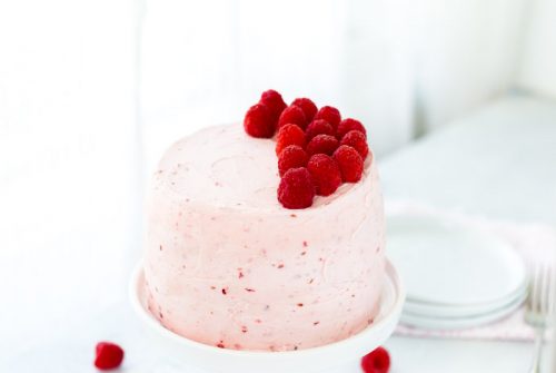 Vanilla Bean Cake with Raspberry Filling and Whipped Vanilla Bean Frosting